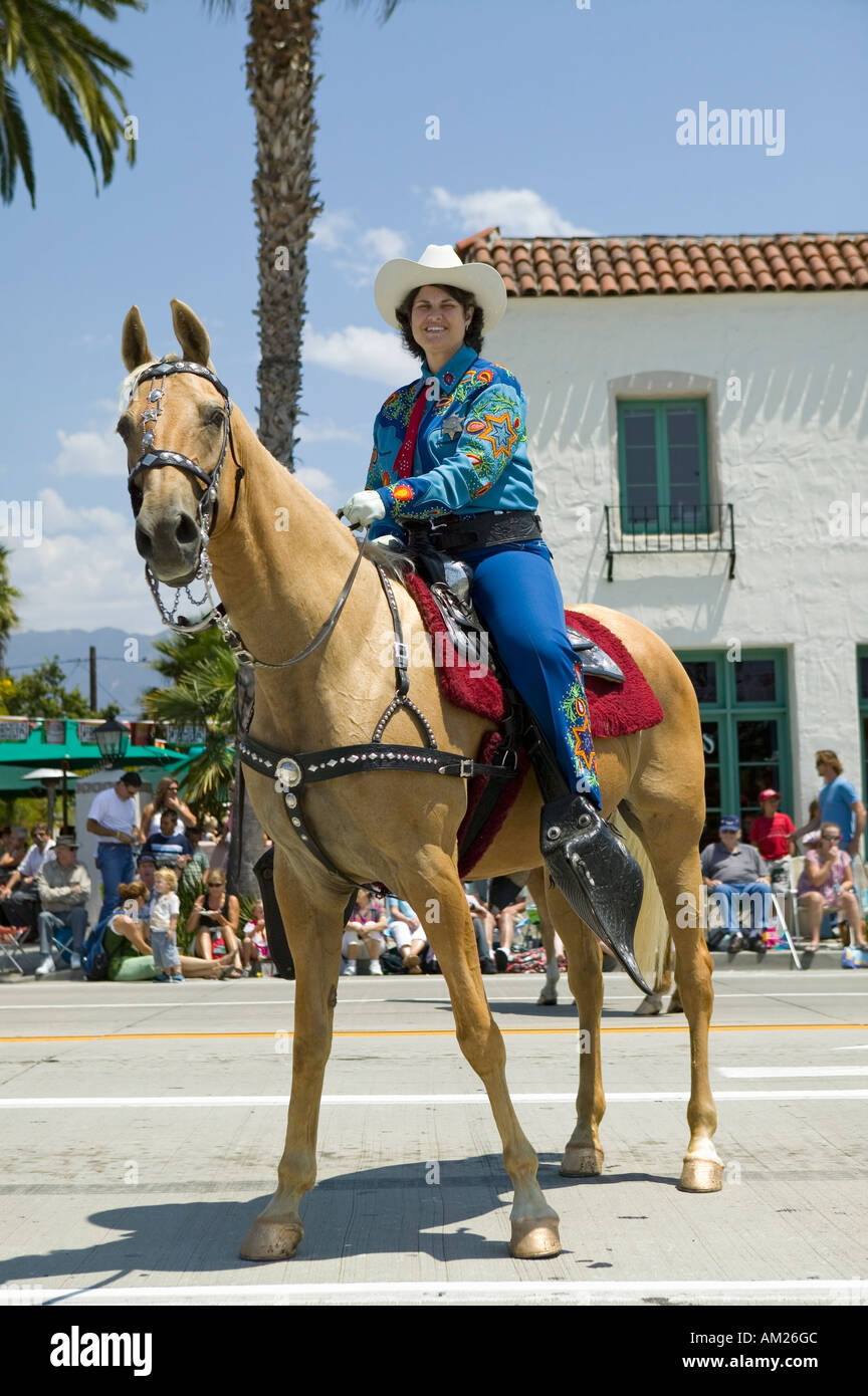 Cowgirl on horse during opening day parade down State Street Santa ...