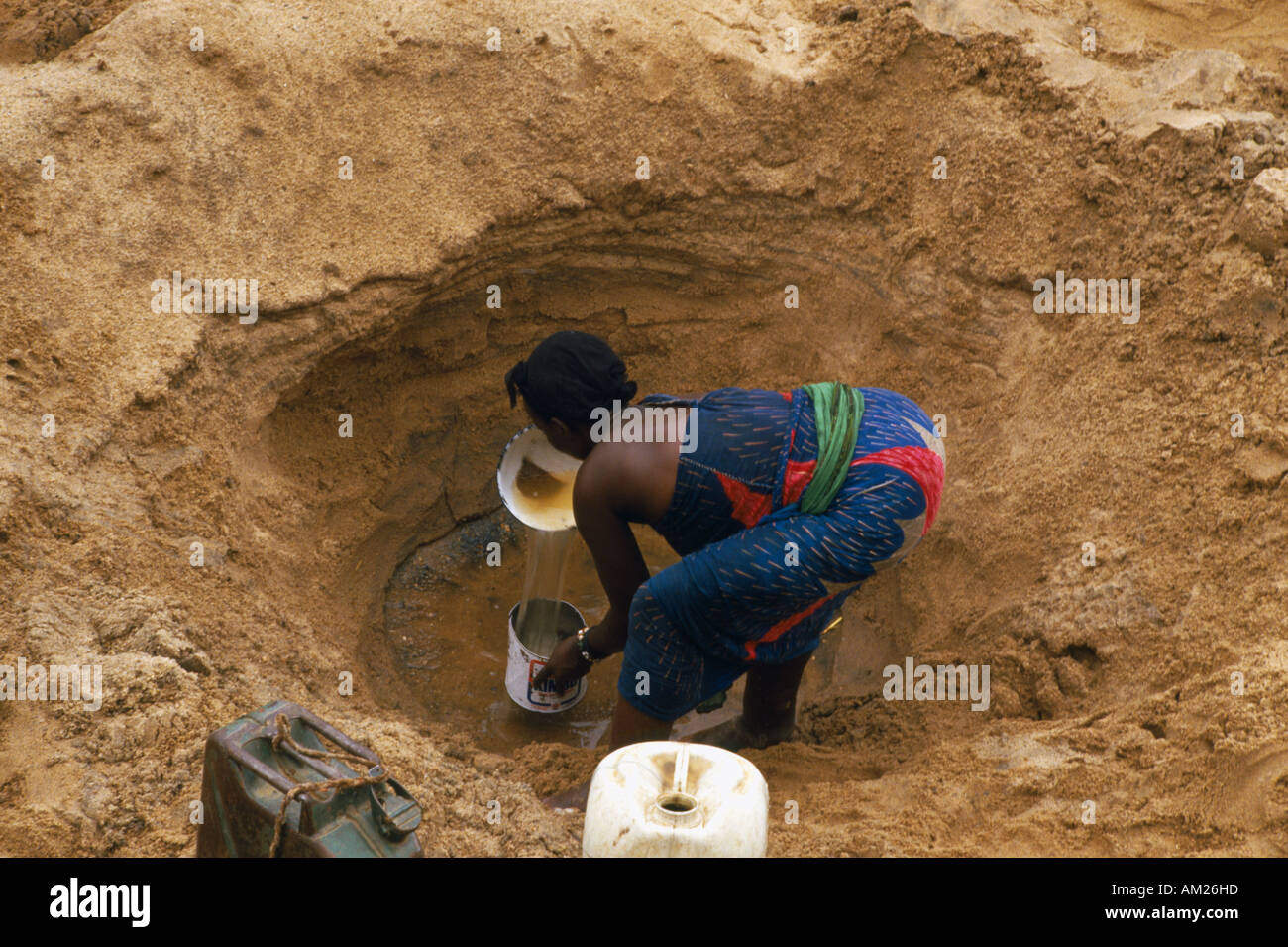 KENYA East Africa Drought Boran woman digging for water in a dry ...