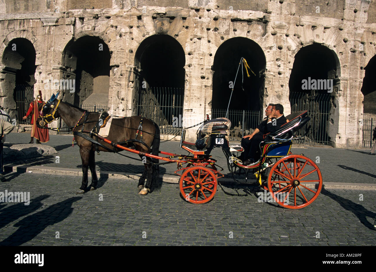 Horse and carriage in front of the Colosseum, Rome, Italy Stock Photo ...
