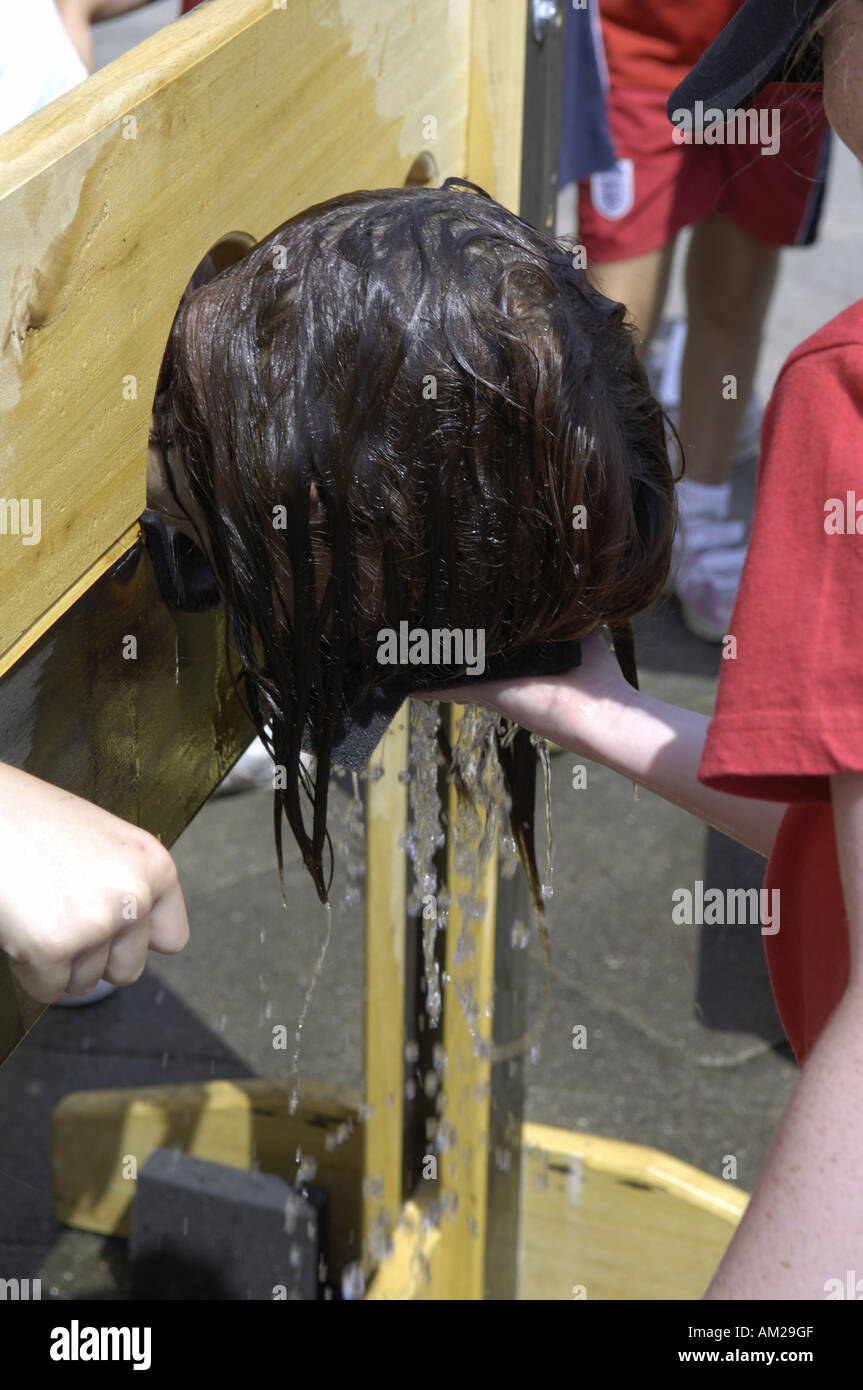 female woman hair wet water heads stocks punishment torture charity ...