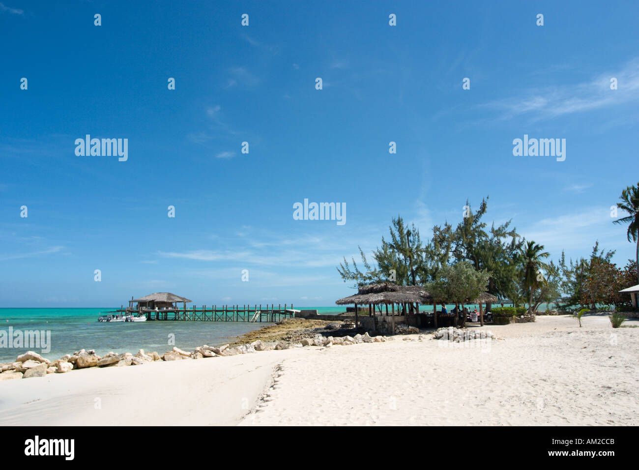 Beach and beach bar at Small Hope Bay Lodge, Fresh Creek, Andros ...