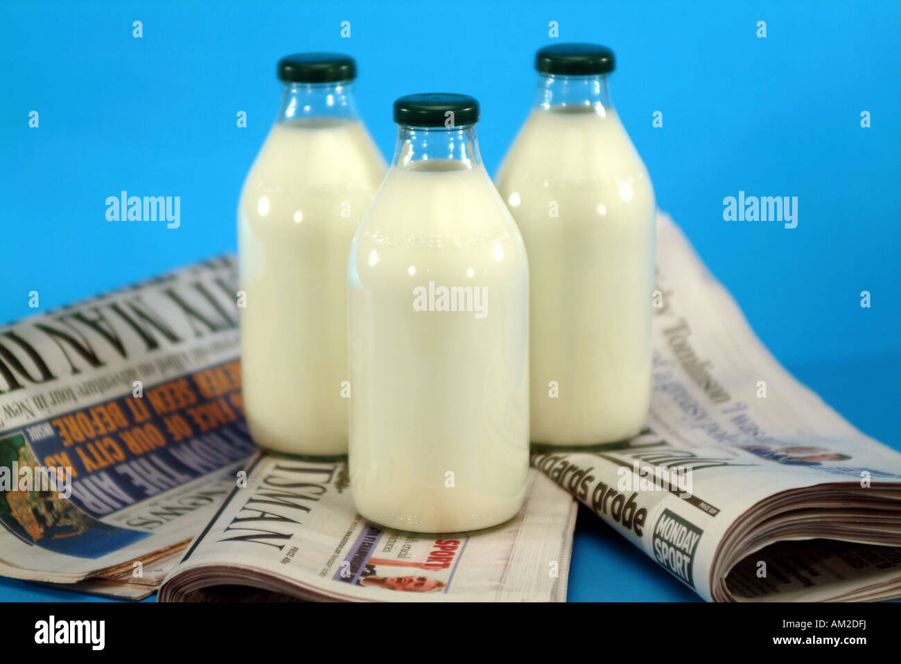 Morning papers and milk Stock Photo - Alamy