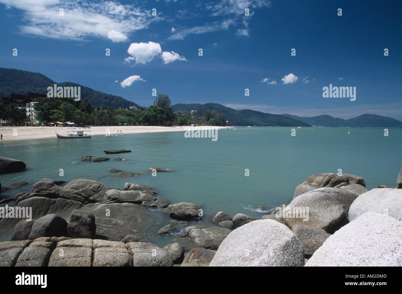 MALAYSIA Penang Batu Ferringhi Beach View over rocks and bay of ...
