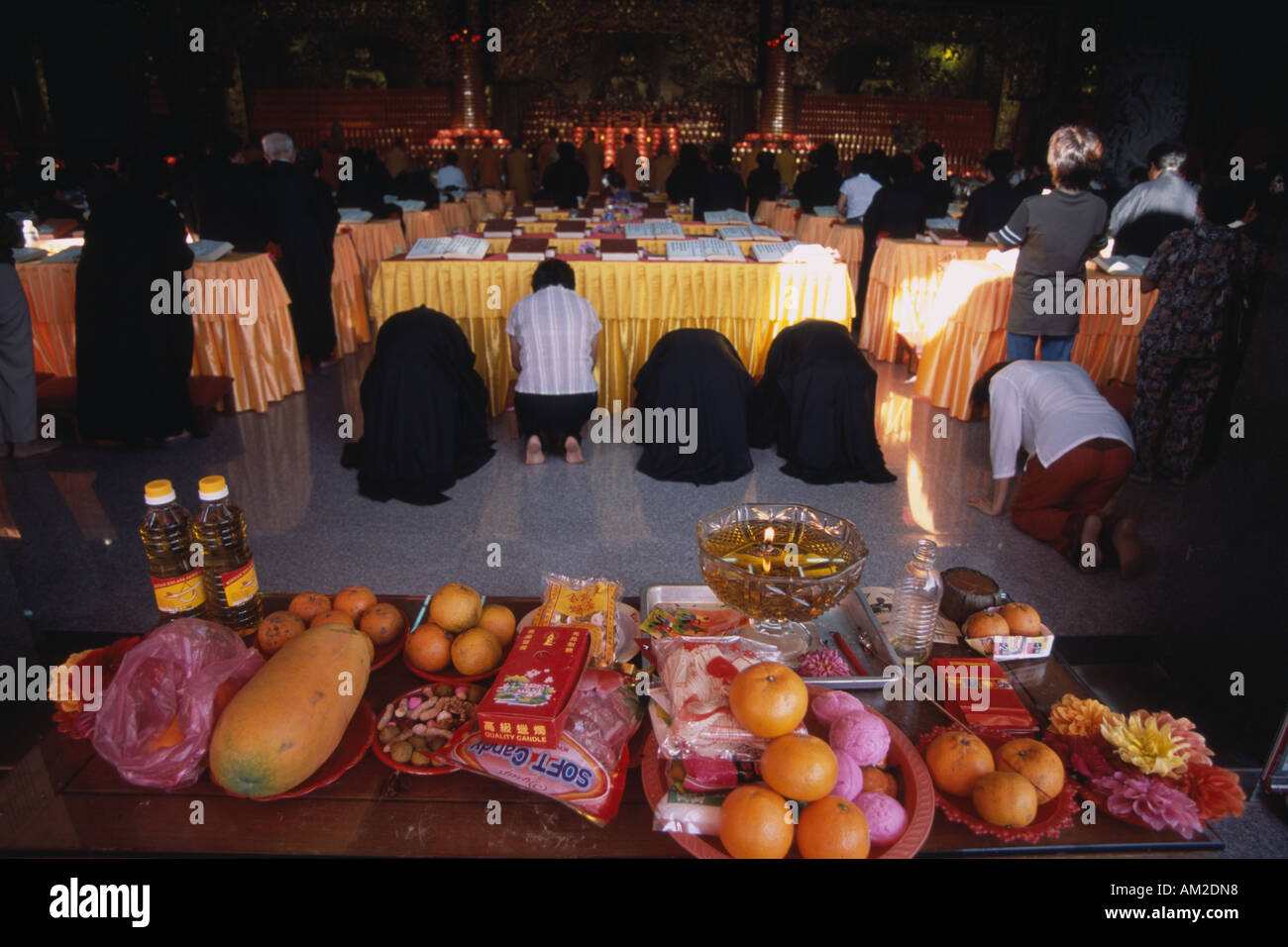 MALAYSIA Penang Lek Lok Si Temple Main Prayer Hall Morning prayers in ...