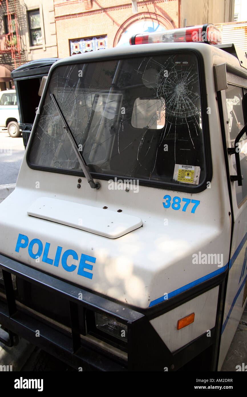 A NYPD Police cart with bullet holes in the windscreen Stock Photo - Alamy
