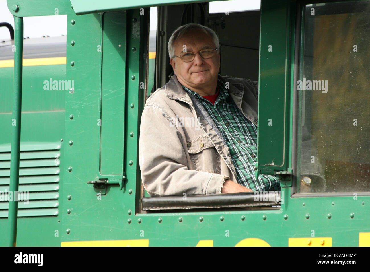Engineer in locomotive cab of Green Mountain flyer Tourist Train ...