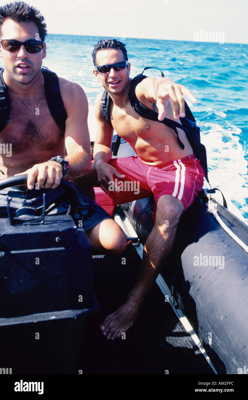 Men boating in an inflatable boat in Hawaii Stock Photo - Alamy