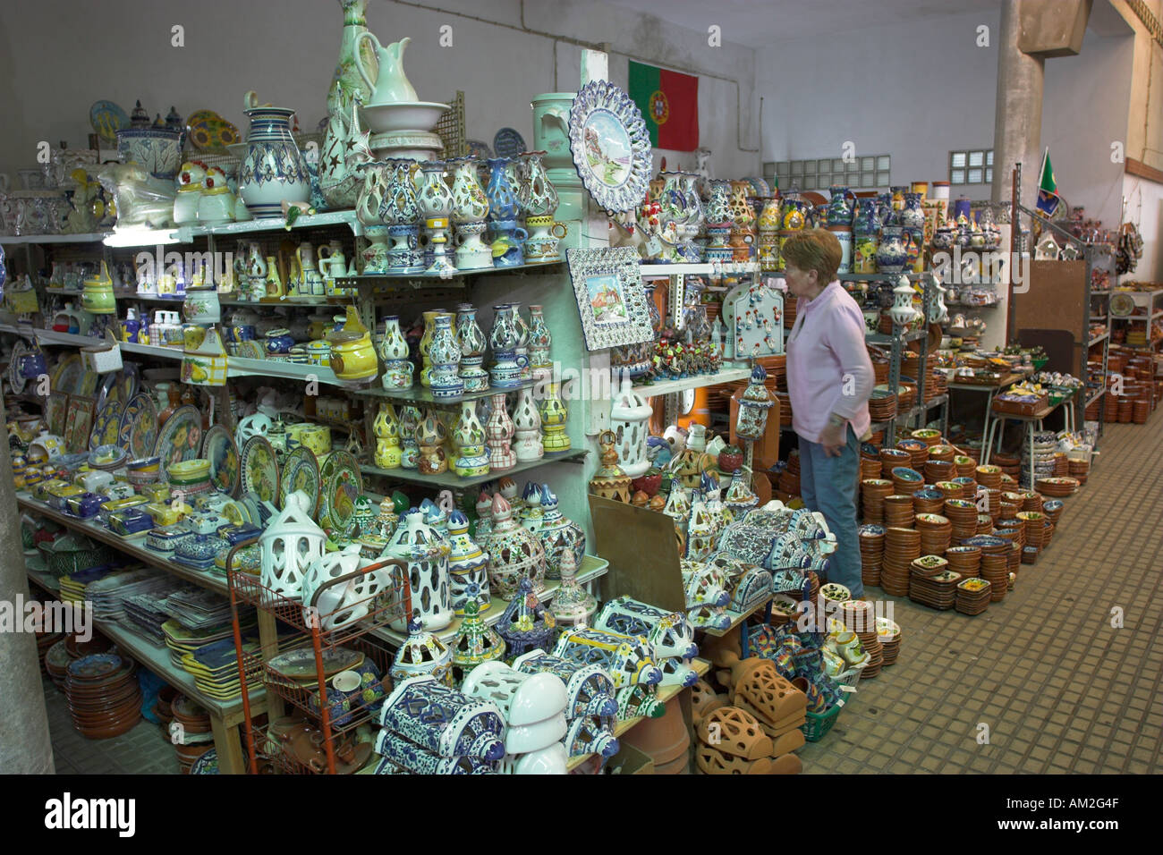 Pottery stall at an indoor market in the town of Loule in the central ...