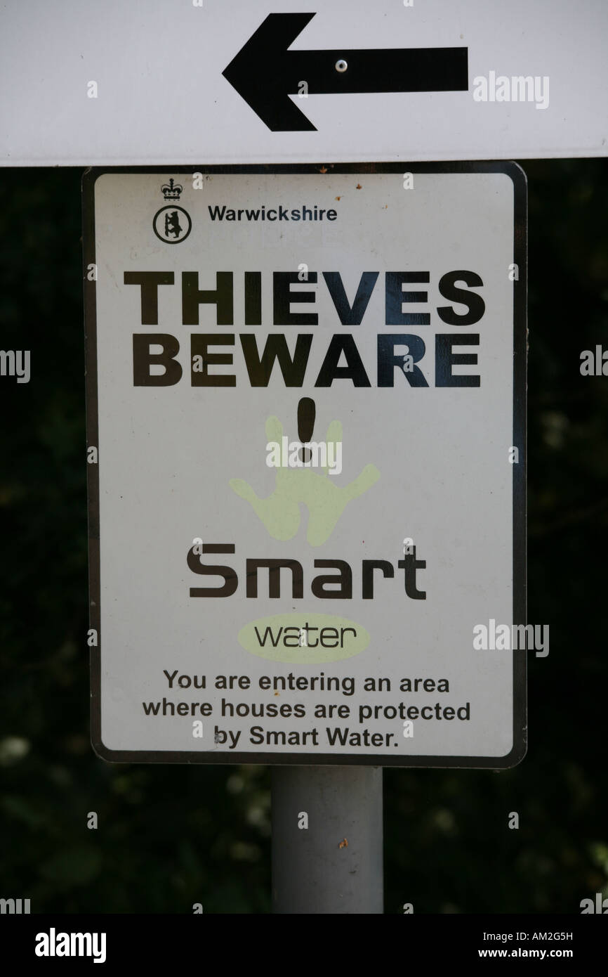 Thieves Beware Smart Water sign Stock Photo - Alamy