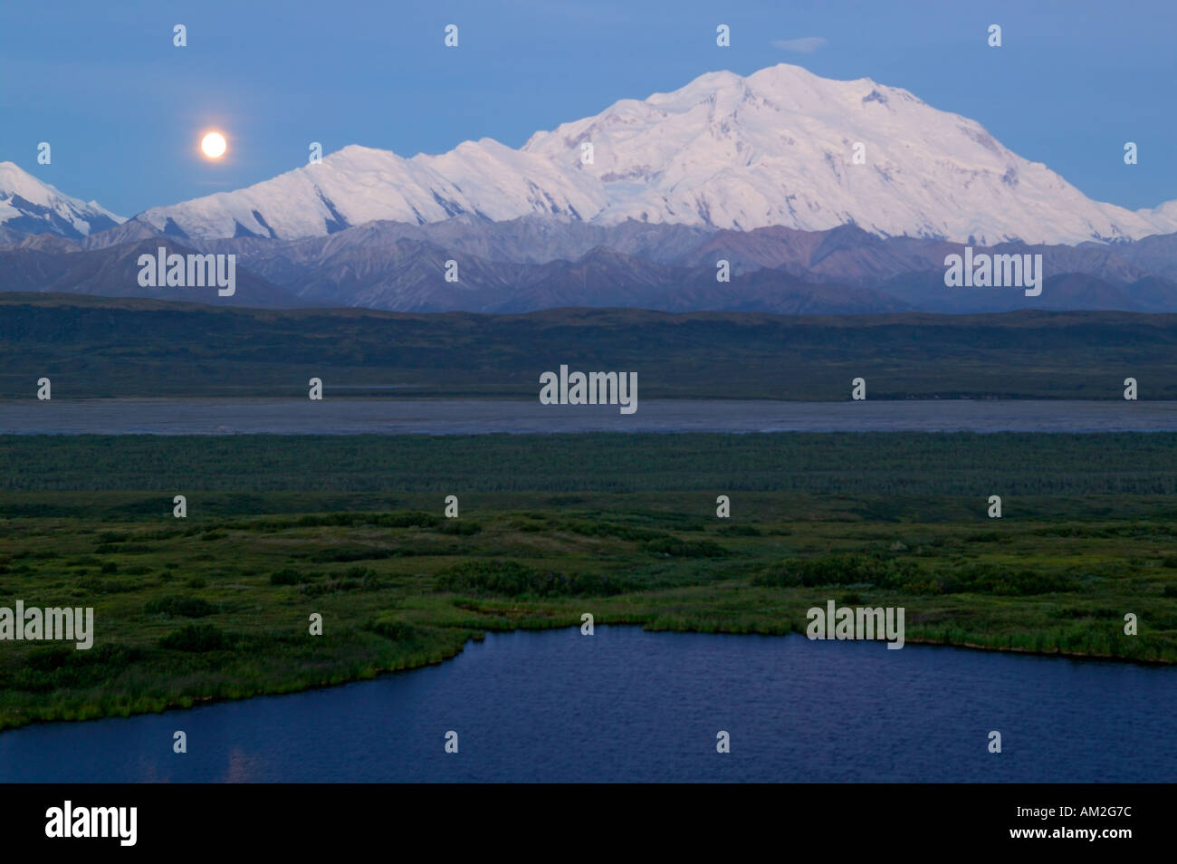 The full moon and Mt McKinley Denali National Park Alaska Stock Photo ...