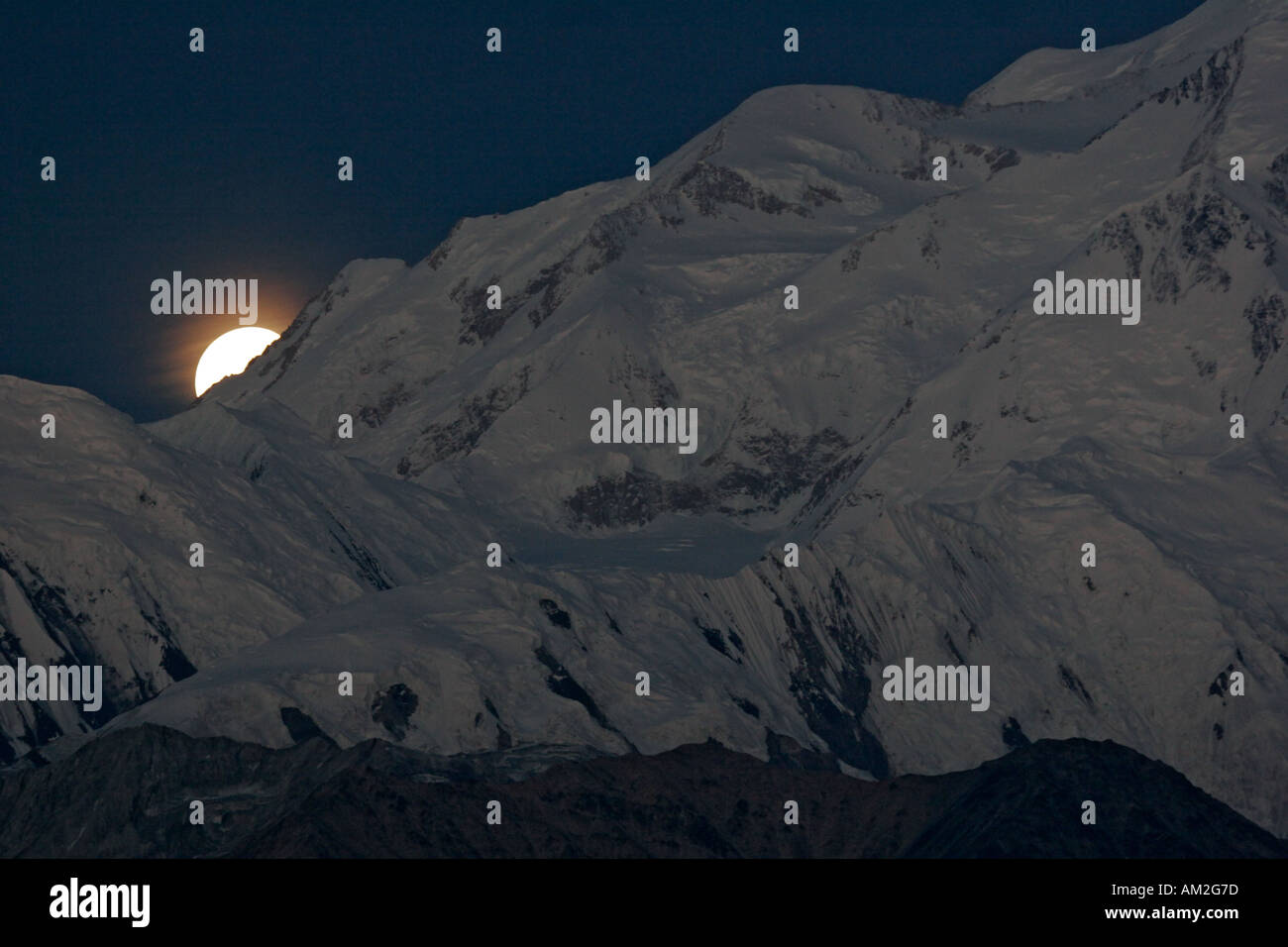 The full moon and Mt McKinley Denali National Park Alaska Stock Photo ...