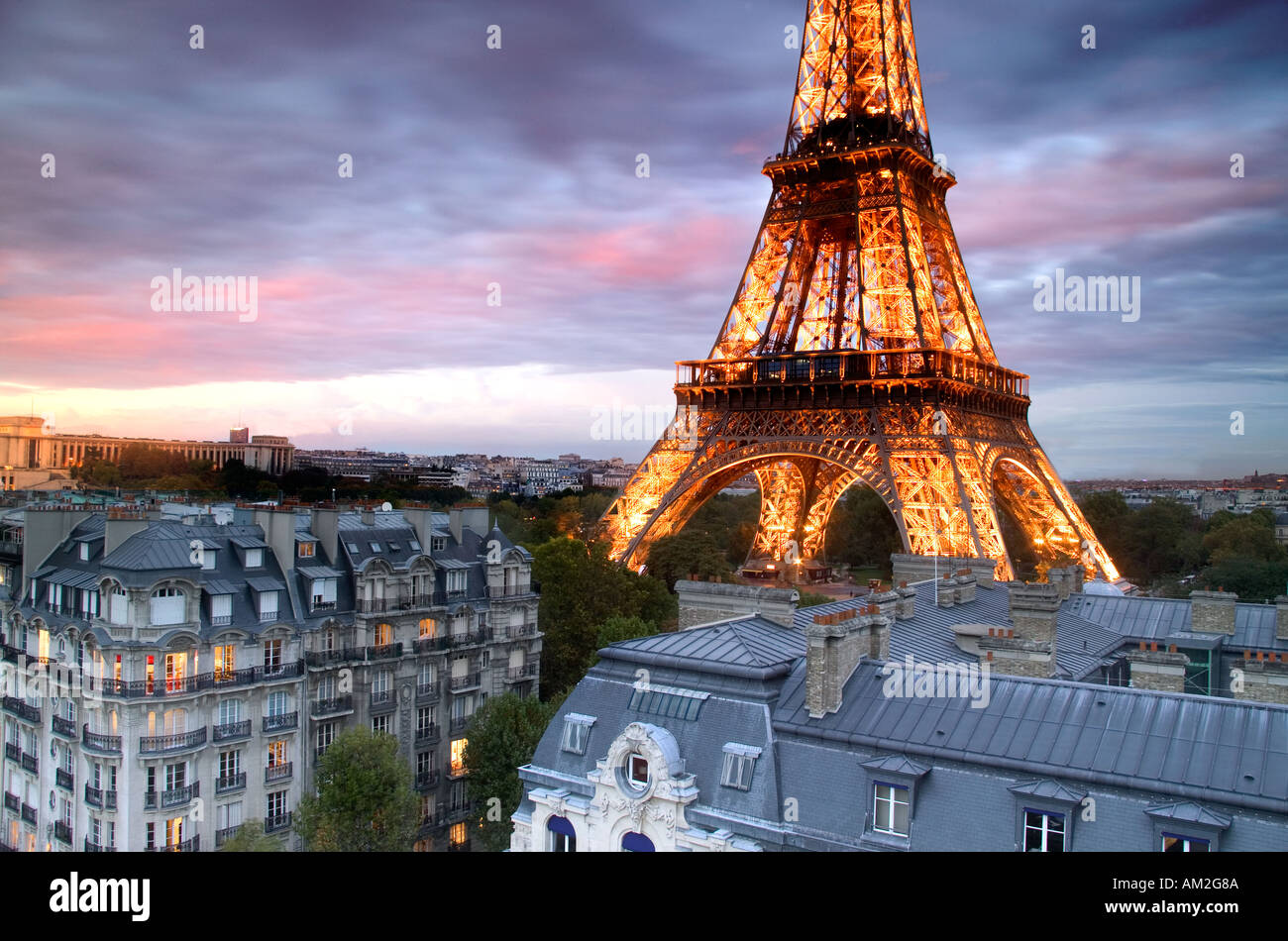 France Paris Eiffel Tower at sunset towering over the city Stock Photo ...