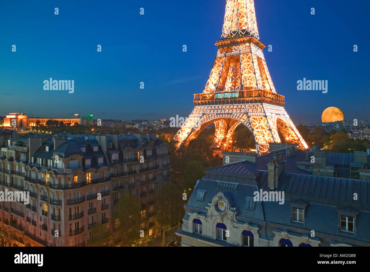 France Paris Eiffel tower and moon rising over city Stock Photo - Alamy