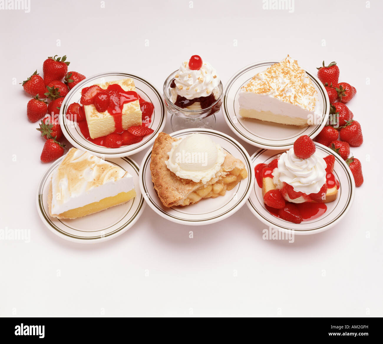 assortment desserts lemon coconut meringue pie strawberry short cake ...