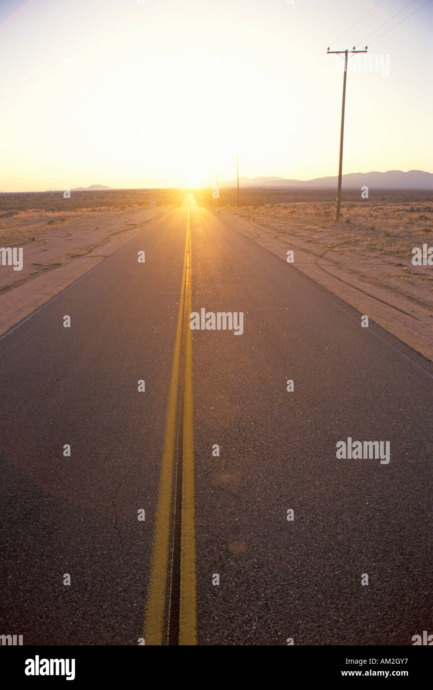 A highway during sunset in Mojave California Stock Photo - Alamy
