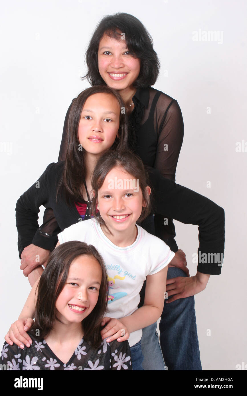 family portrait mother with three daughters Stock Photo - Alamy