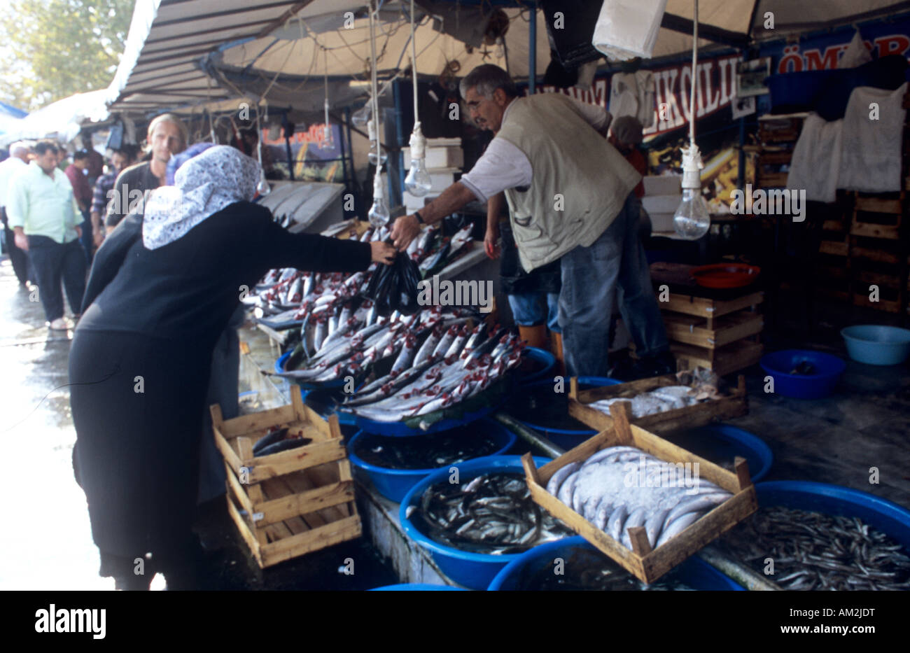 Buying fish at the market at Karakoy, Istanbul, Turkey Stock Photo - Alamy