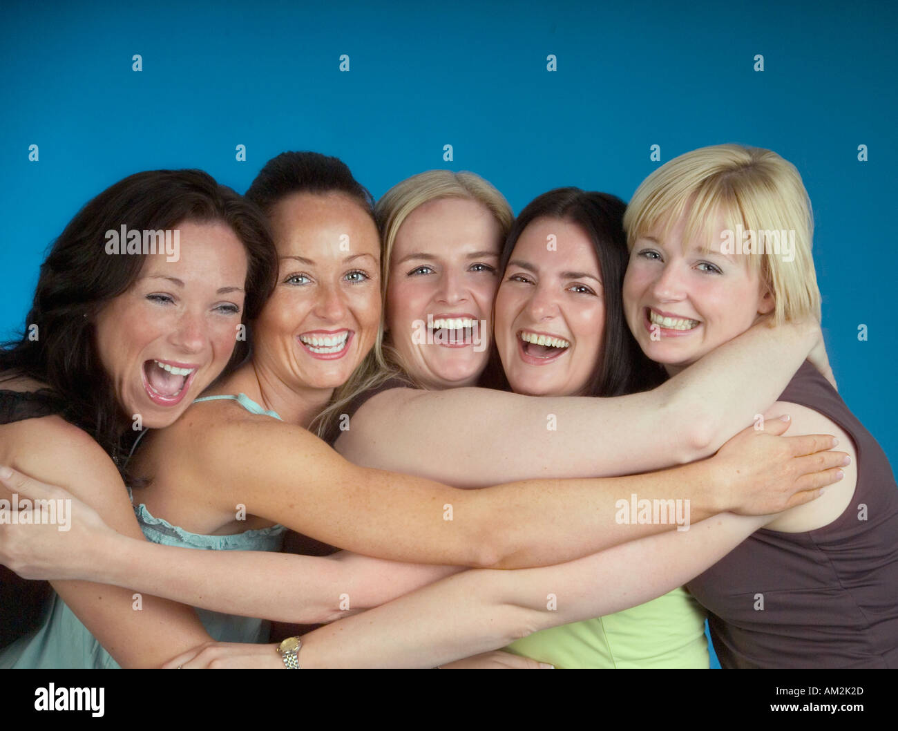 Hug friends greet hi-res stock photography and images - Alamy