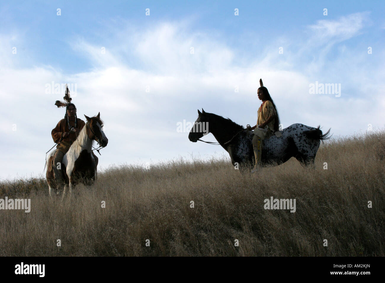 Two young Native American Indians bareback on horses Stock Photo - Alamy