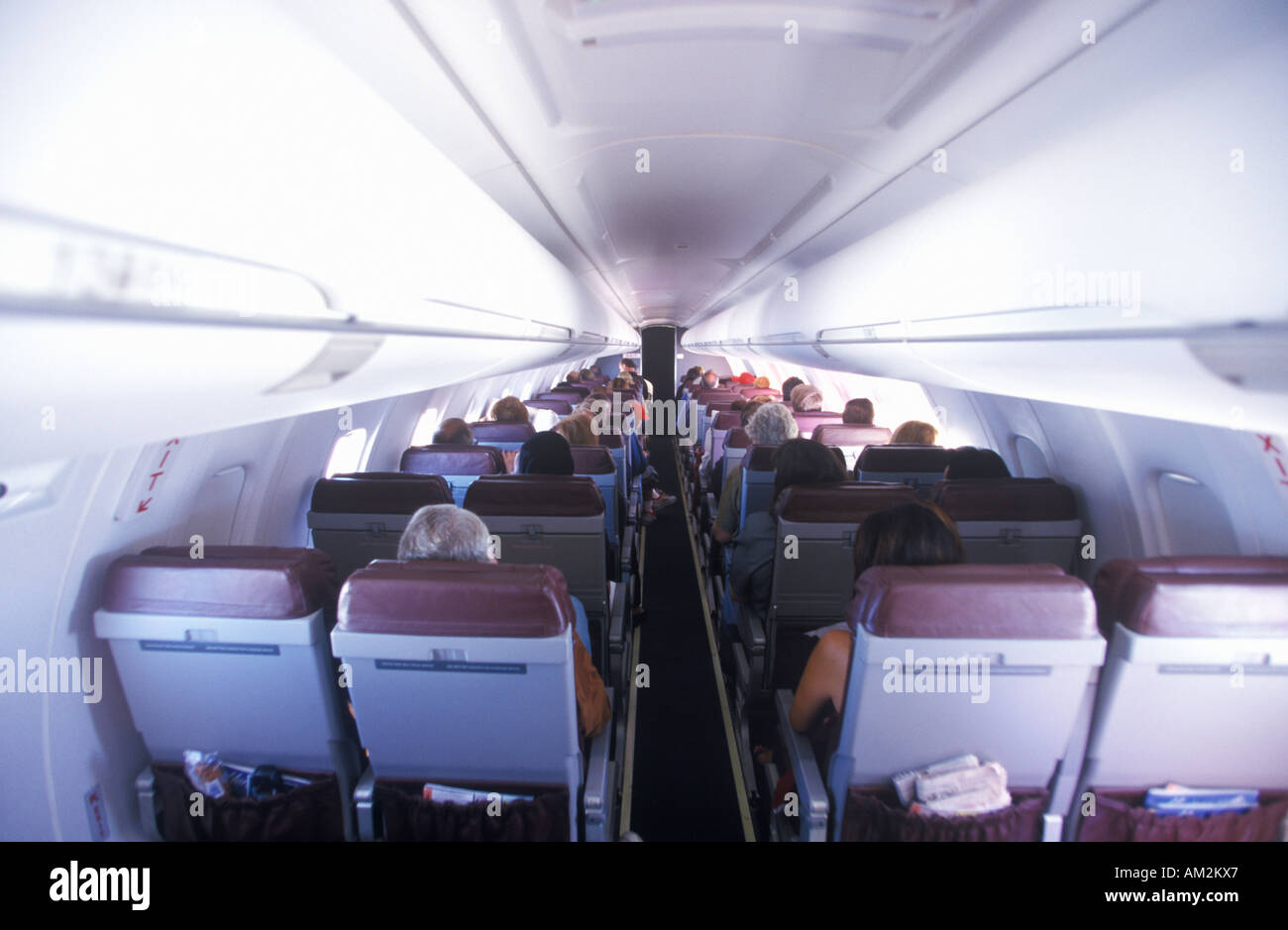 Passengers from the rear of the airplane Stock Photo - Alamy