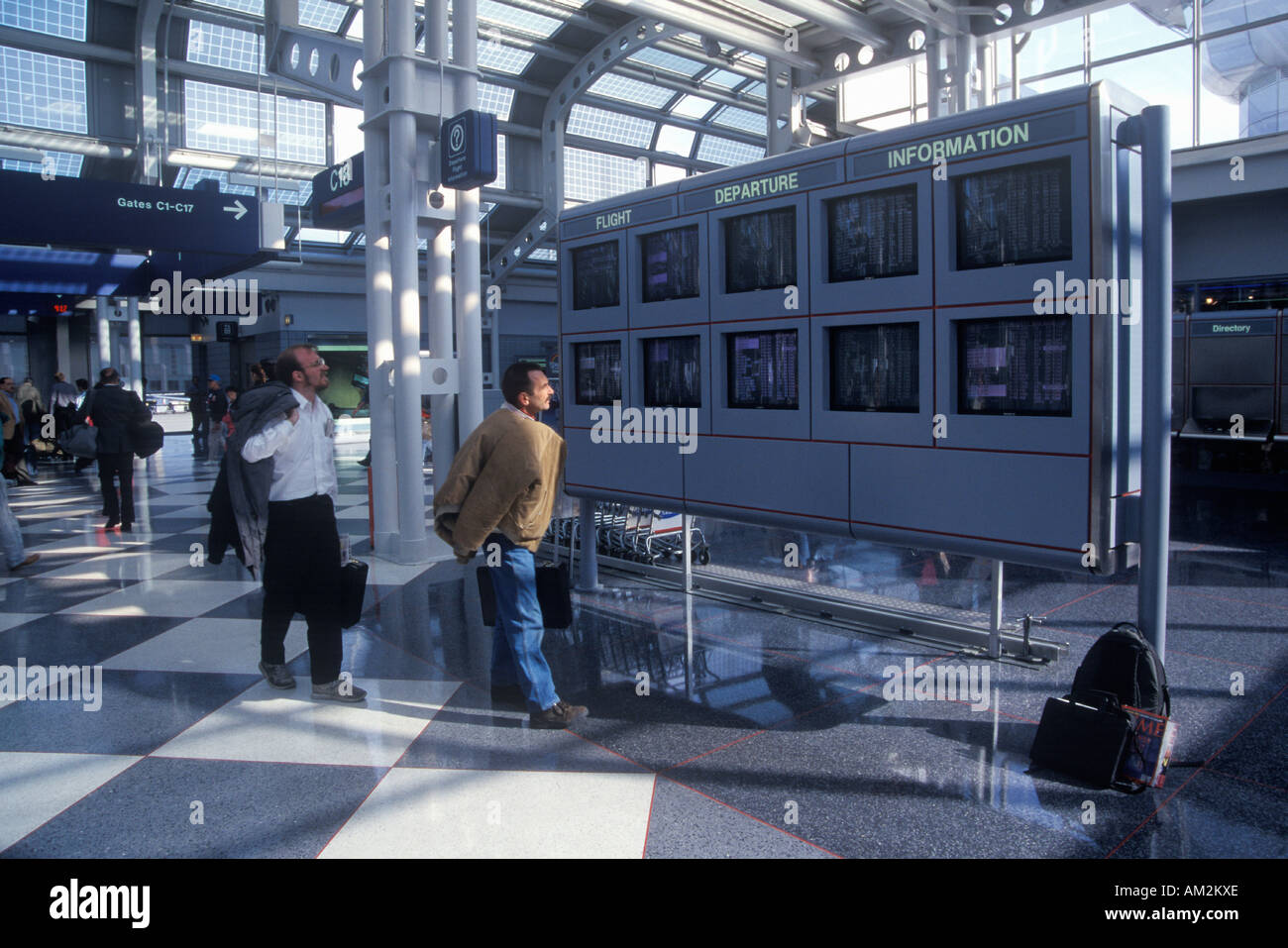 The departure and arrivals television monitors in O Hare Airport in ...
