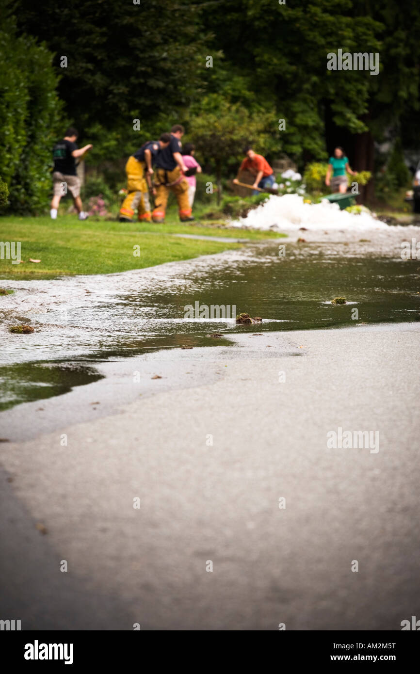 flood in a street due to a pipe breakage Stock Photo - Alamy