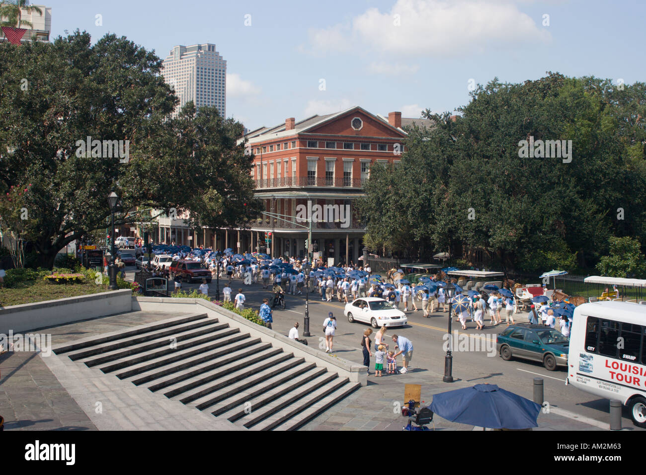 Street performers in parade on Decatur Street in the French Quarter of ...