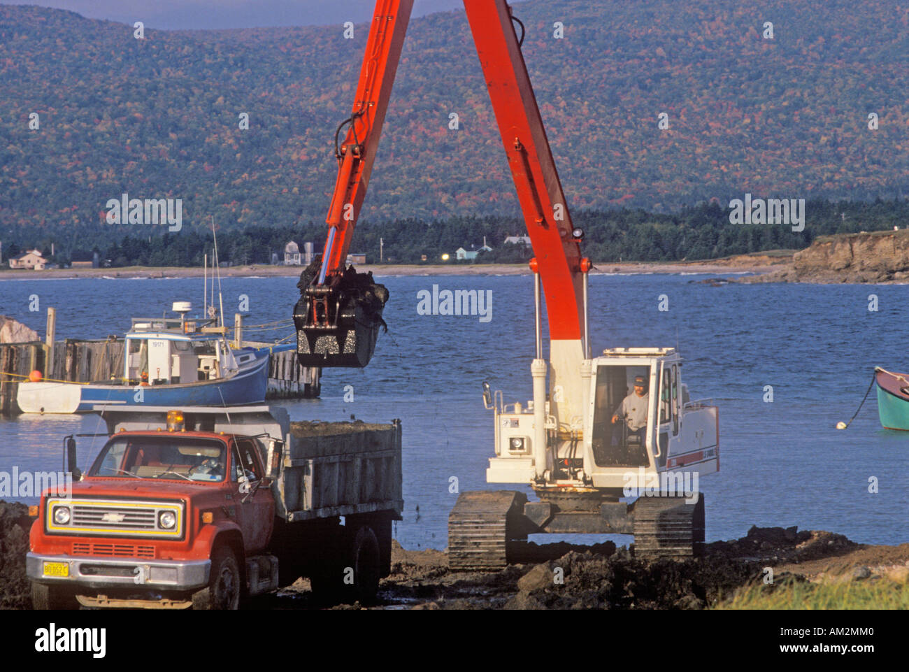 Dredging the harbor in Nova Scotia Stock Photo - Alamy