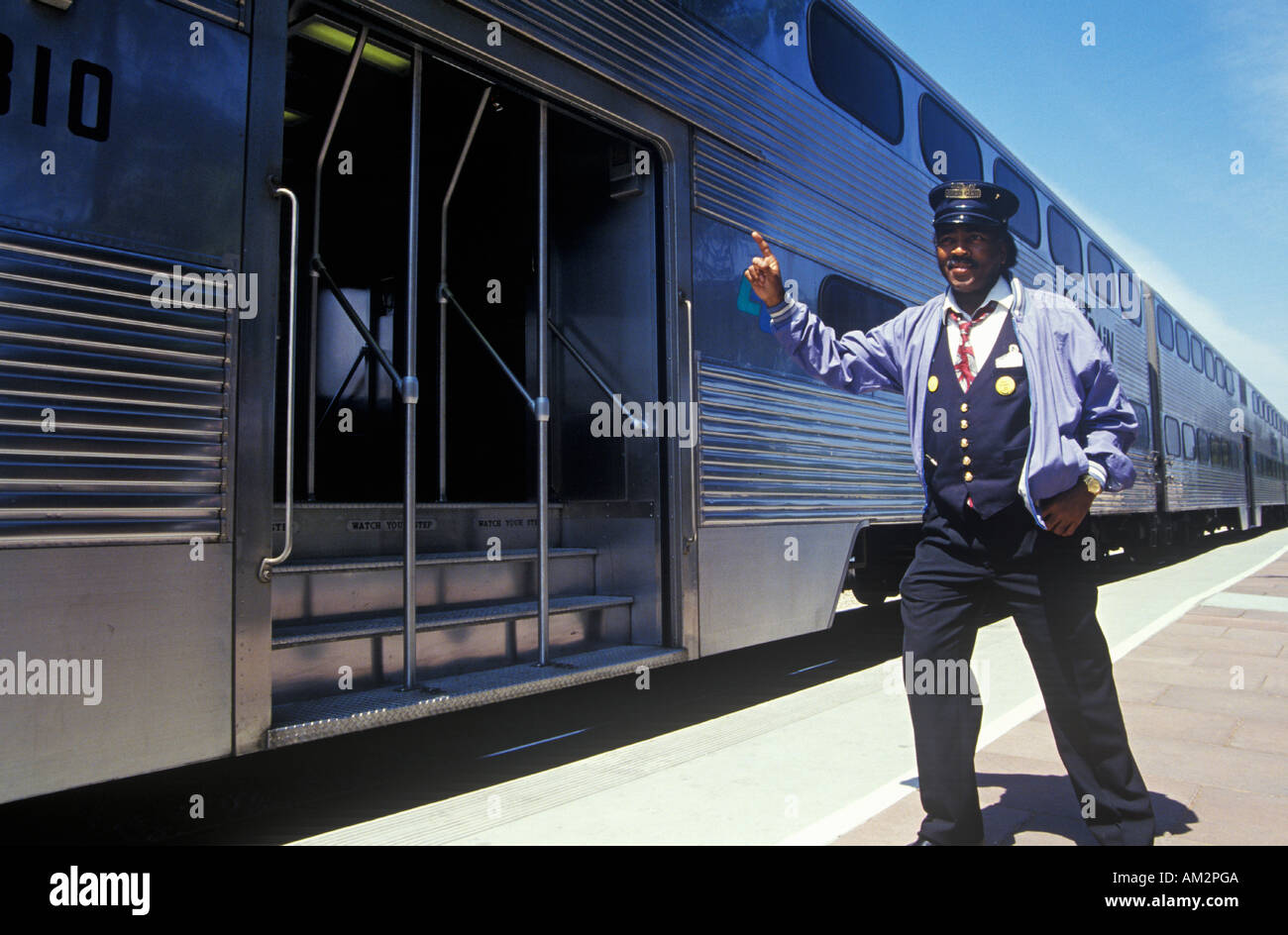 A man directing traffic at Caltrain Cupertino California Stock Photo ...