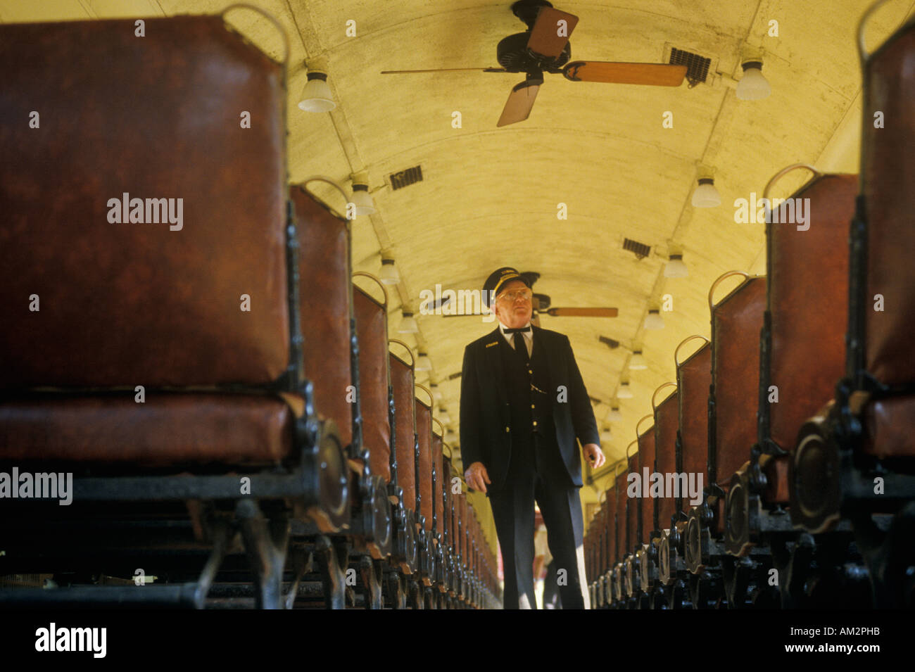 A train conductor aboard a standard gauge steam engine train in Eureka ...