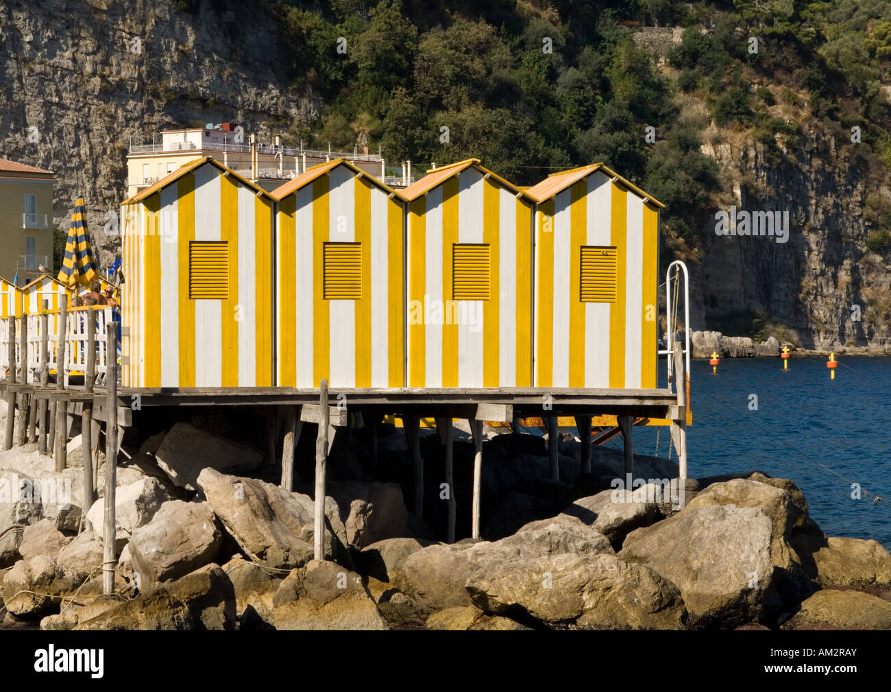 Yellow and white striped bathing huts, Marina Grande, Sorrento, Italy ...