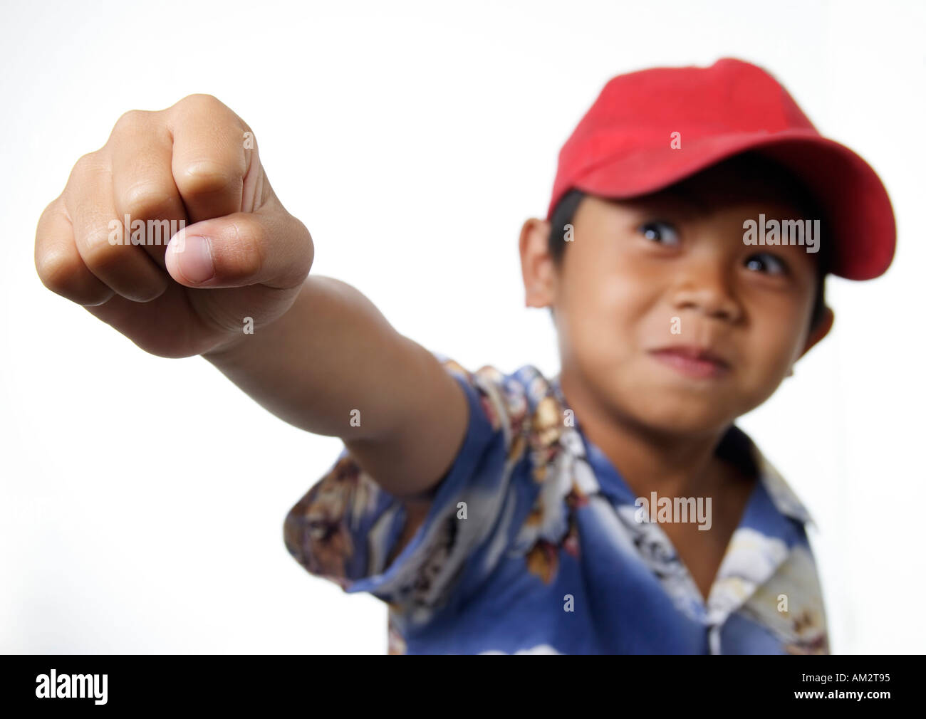 Child Accomplishes and raises fist Stock Photo - Alamy
