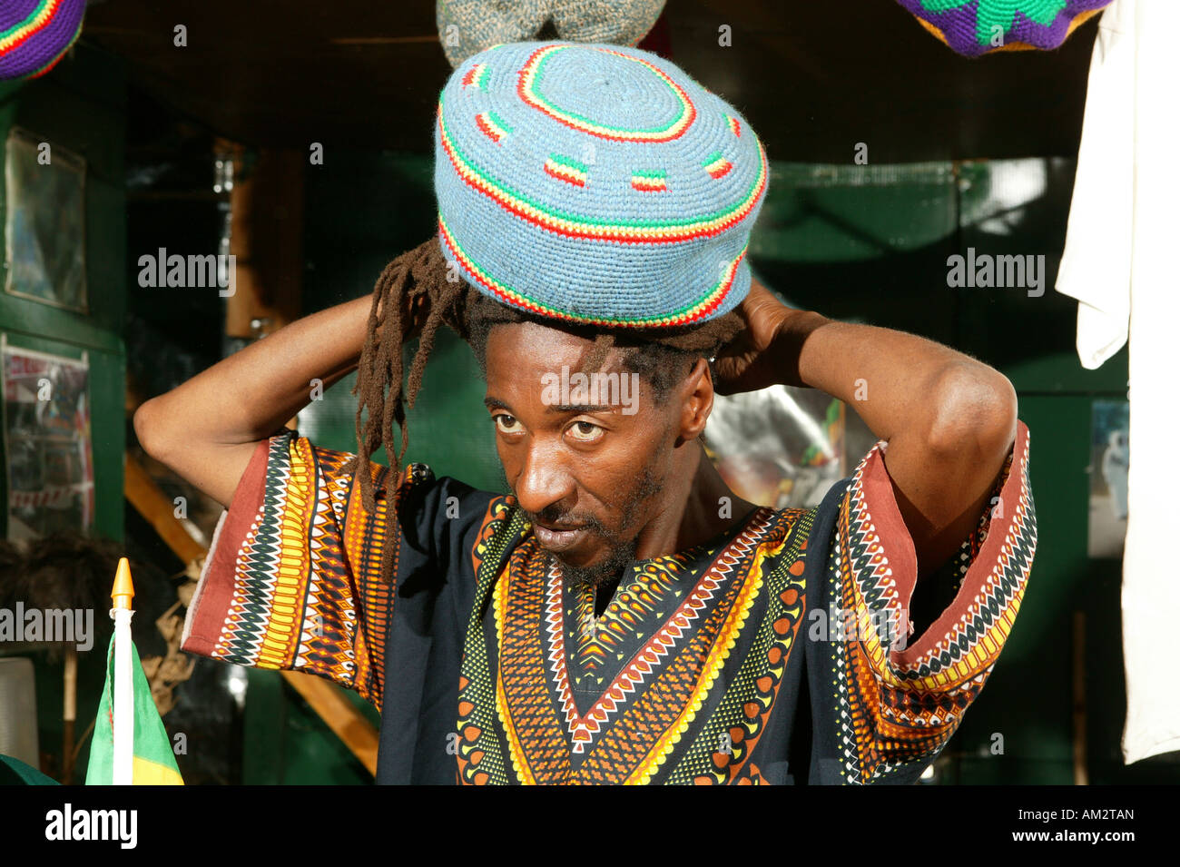 "Press officer" of the Rastafari Marcus Garvey Community trying on a ...