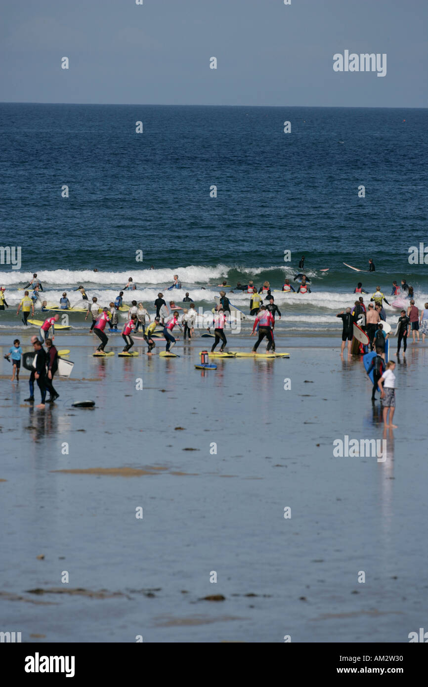 Polzeath surfer beach cornwall surfing hi-res stock photography and ...