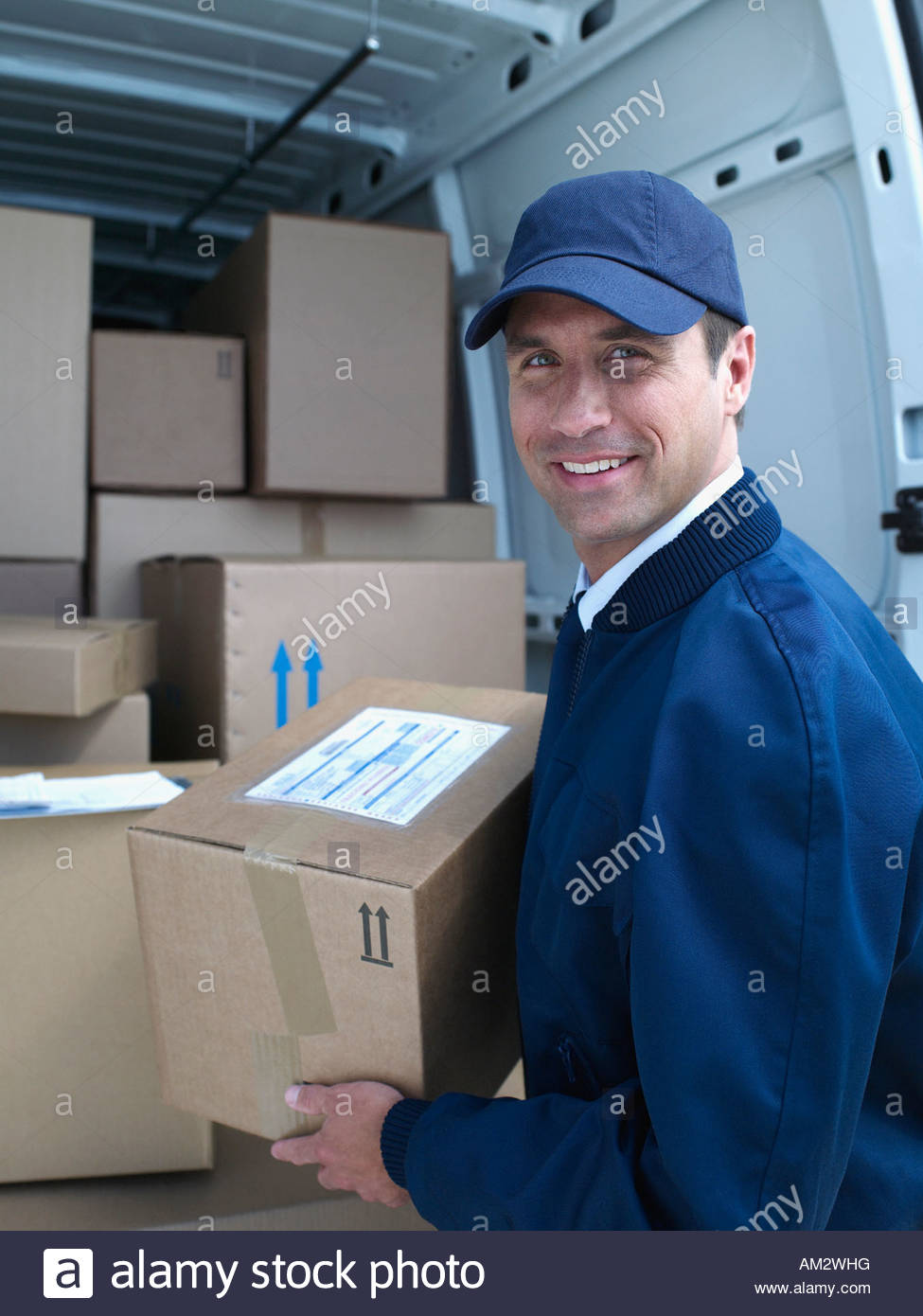 Parcel Delivery Man Stock Photos & Parcel Delivery Man Stock Images - Alamy
