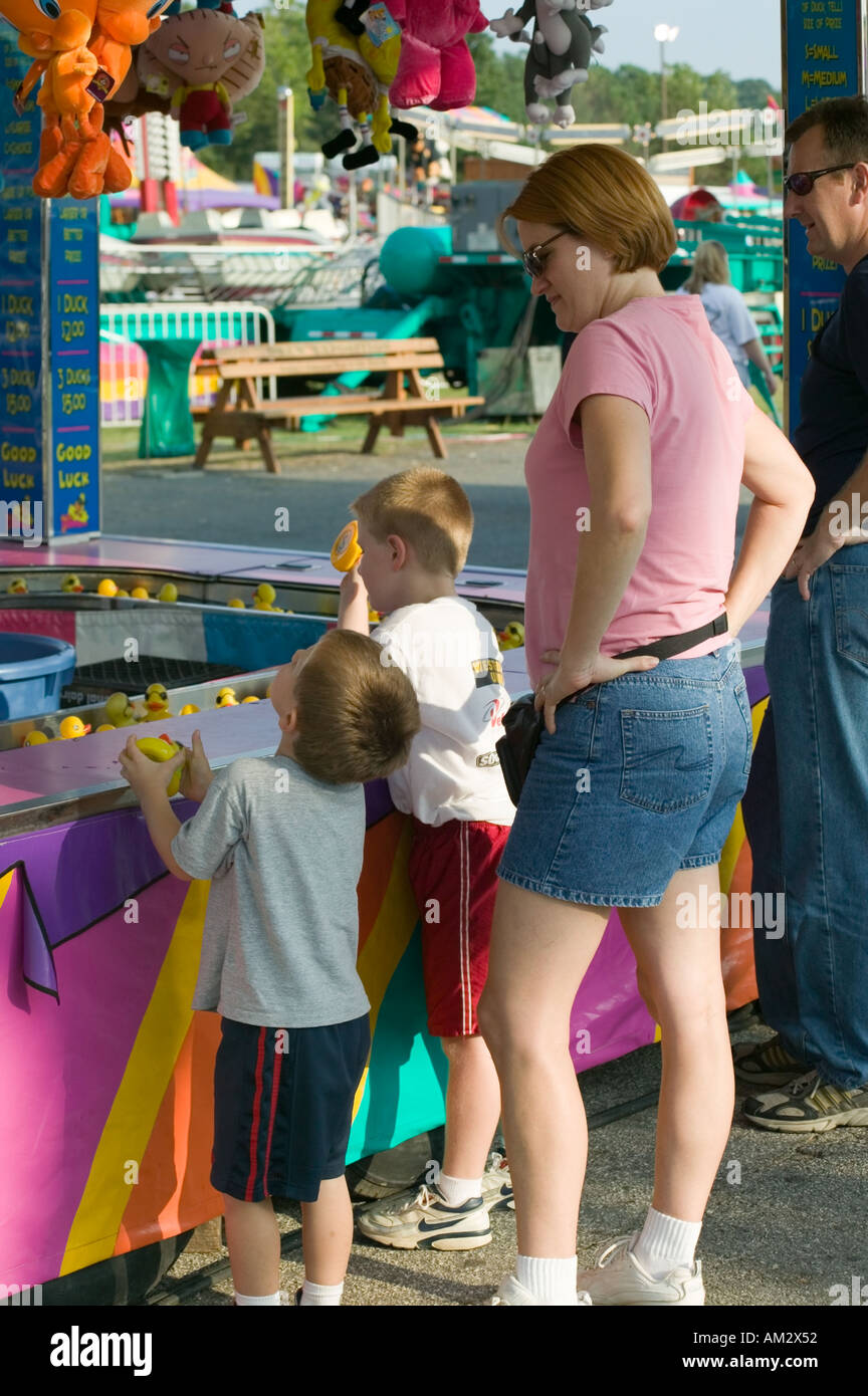 county fair amusements 9 games children Stock Photo - Alamy