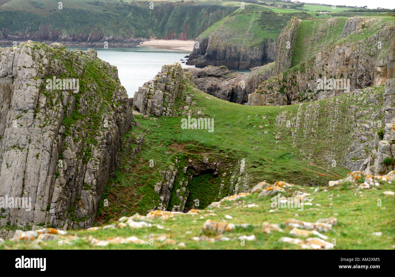 A rock formation known as the Saddle with Skinkle Haven Pembrokeshire ...