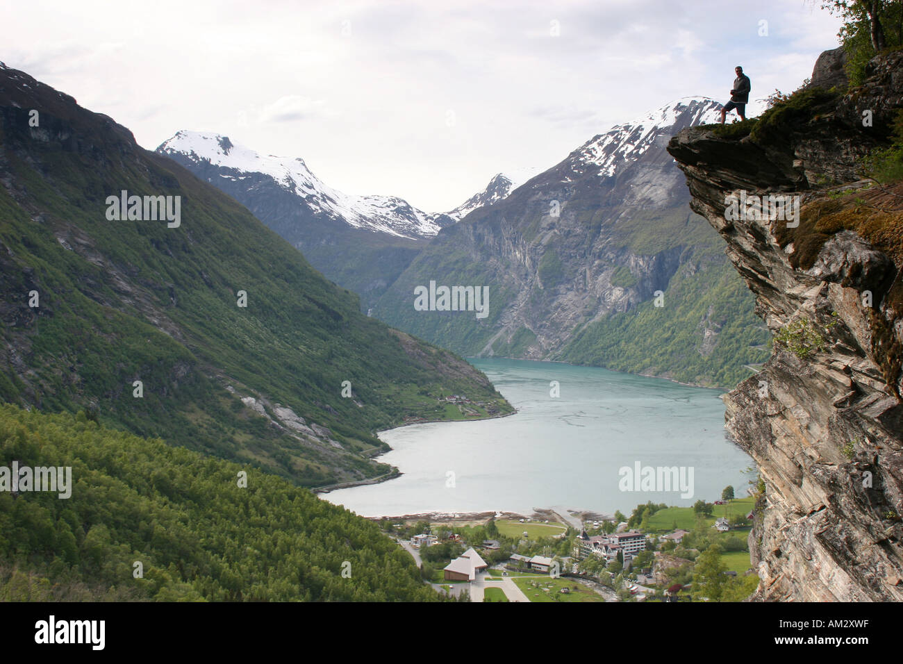 Geiranger is a small tourist town in the western part of Norway man on ...