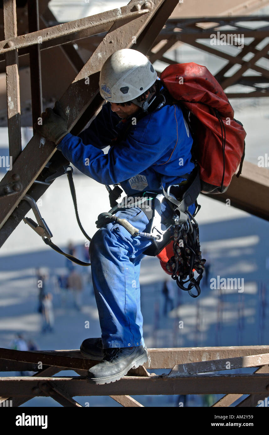 Construction workers on the Eiffel Tower Paris France Stock Photo - Alamy