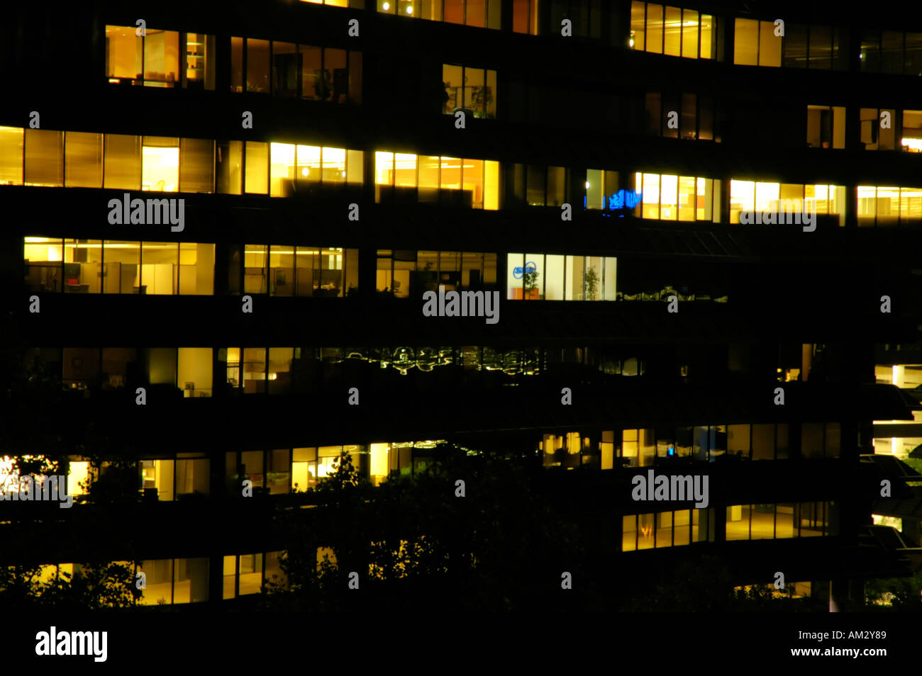 Night view of the lights from a modern high rise office building in the ...