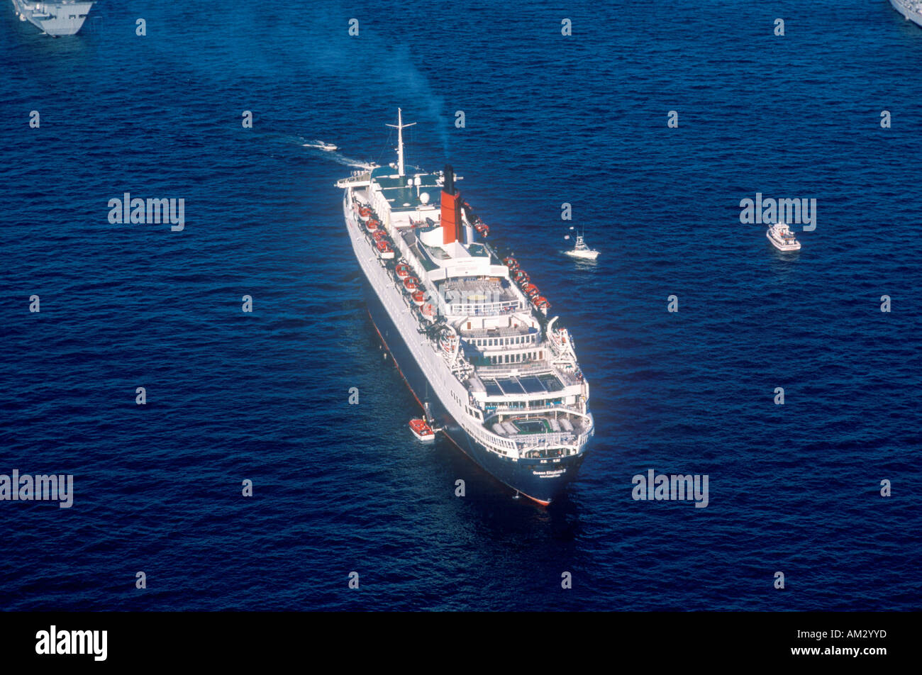 The QE2 sailing into New York Harbor for the Statue of Liberty ...