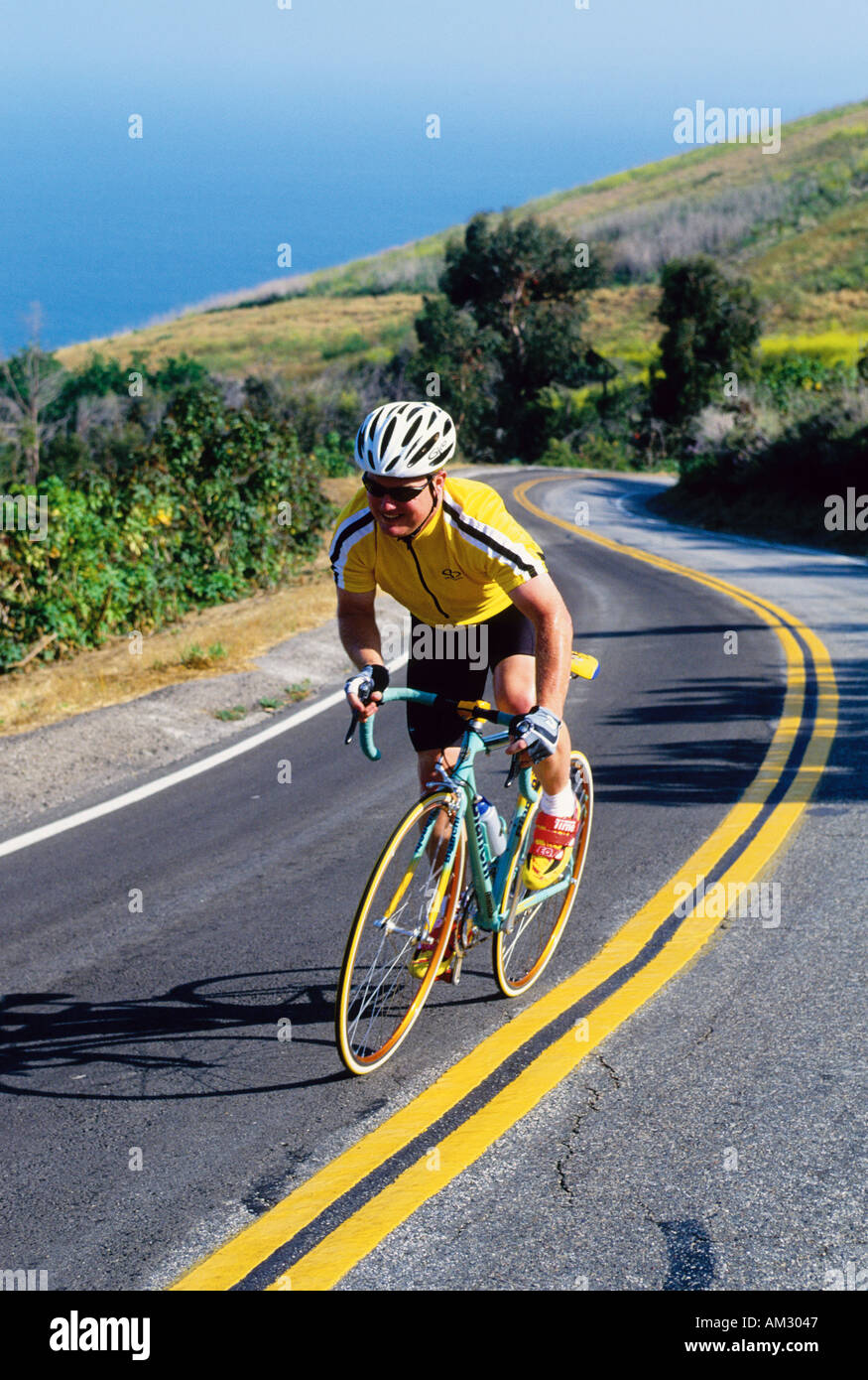 A road biker climbing a hill in Malibu California USA Stock Photo - Alamy