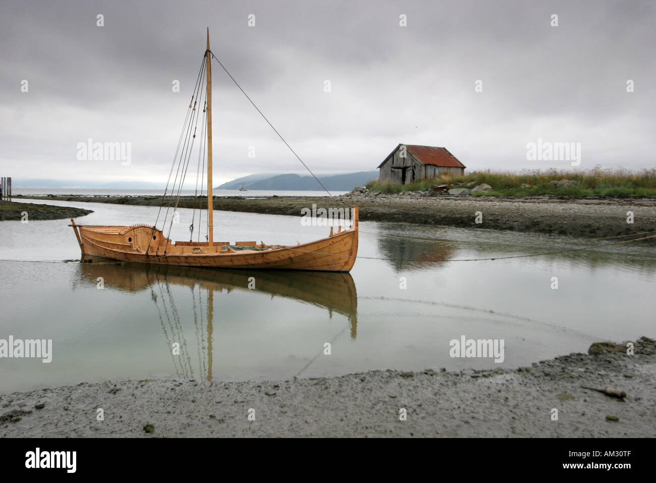 lonely boat on remote island Norway in grey cast weather Stock Photo ...