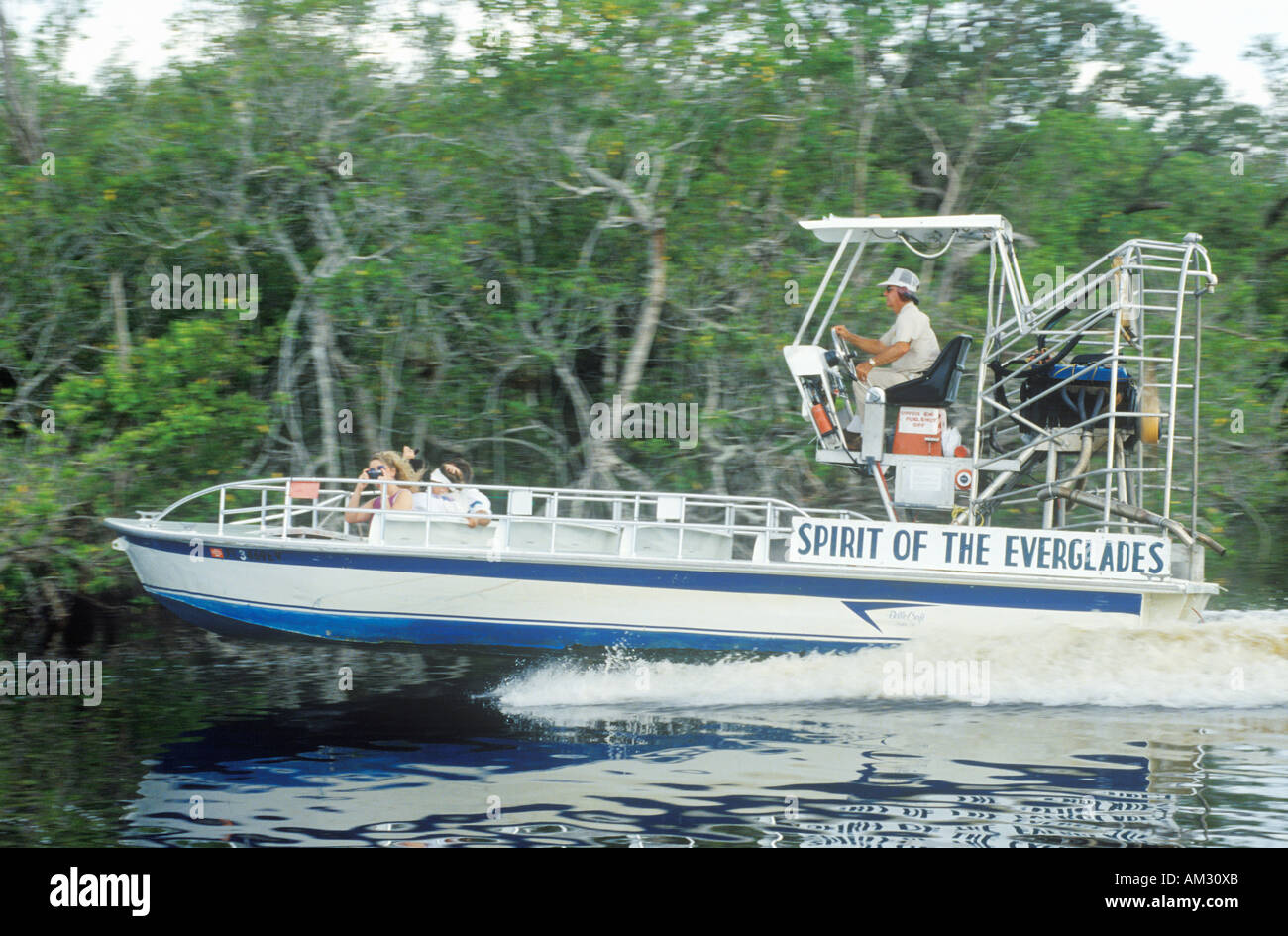 A jet boat tours the Everglades in the Everglades National Park Florida ...