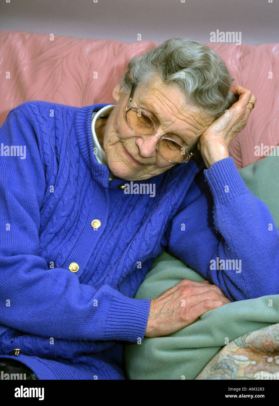 Elderly lady feeling depressed Stock Photo - Alamy