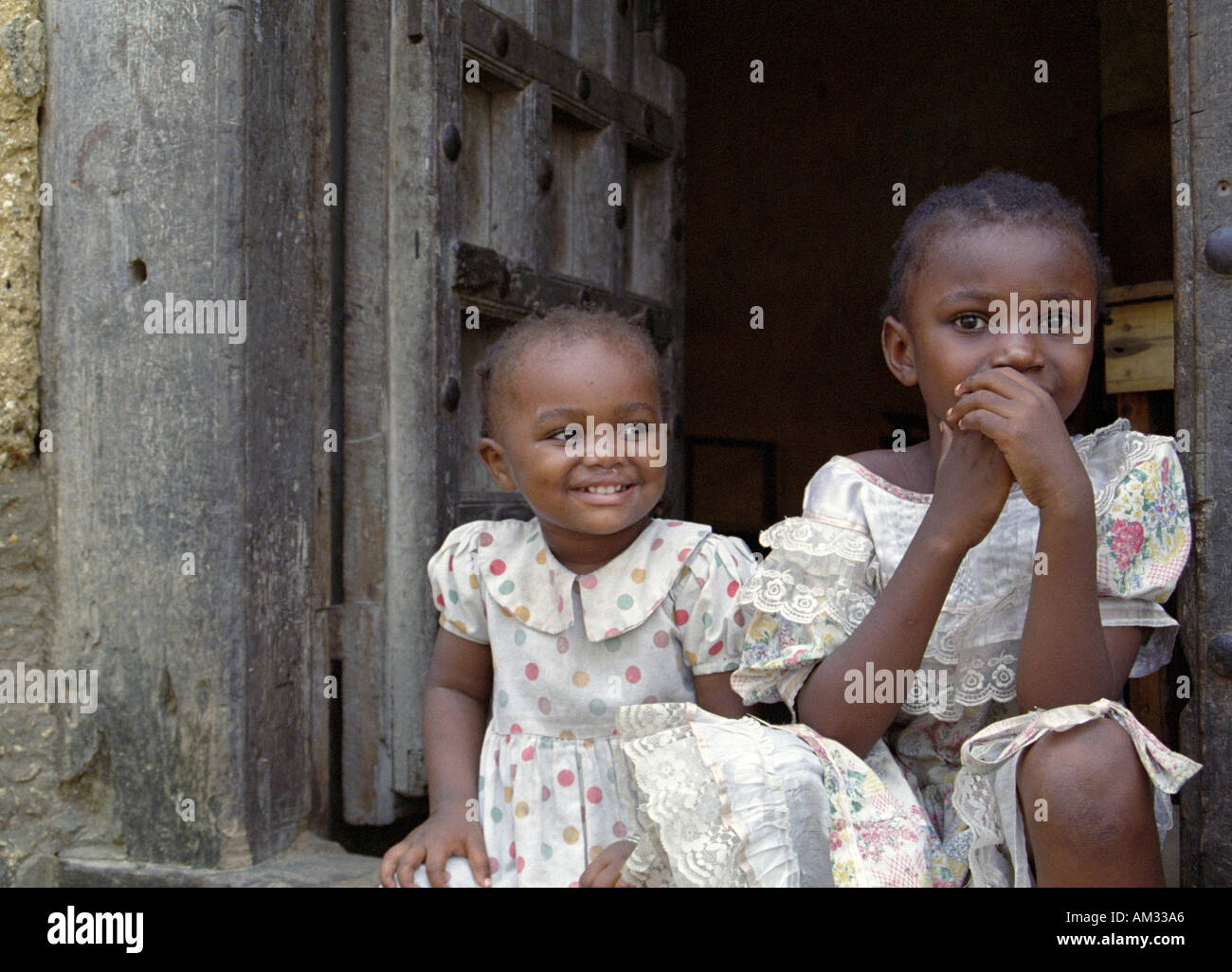 Kids playing in an Arab doorway Stock Photo - Alamy