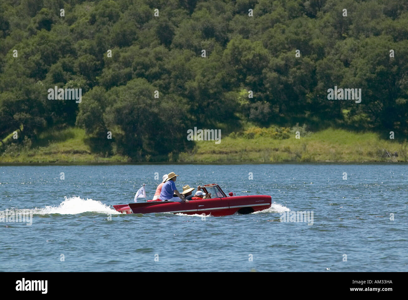 Amphibious convertible car floating down Lake Casitas on a summer day ...