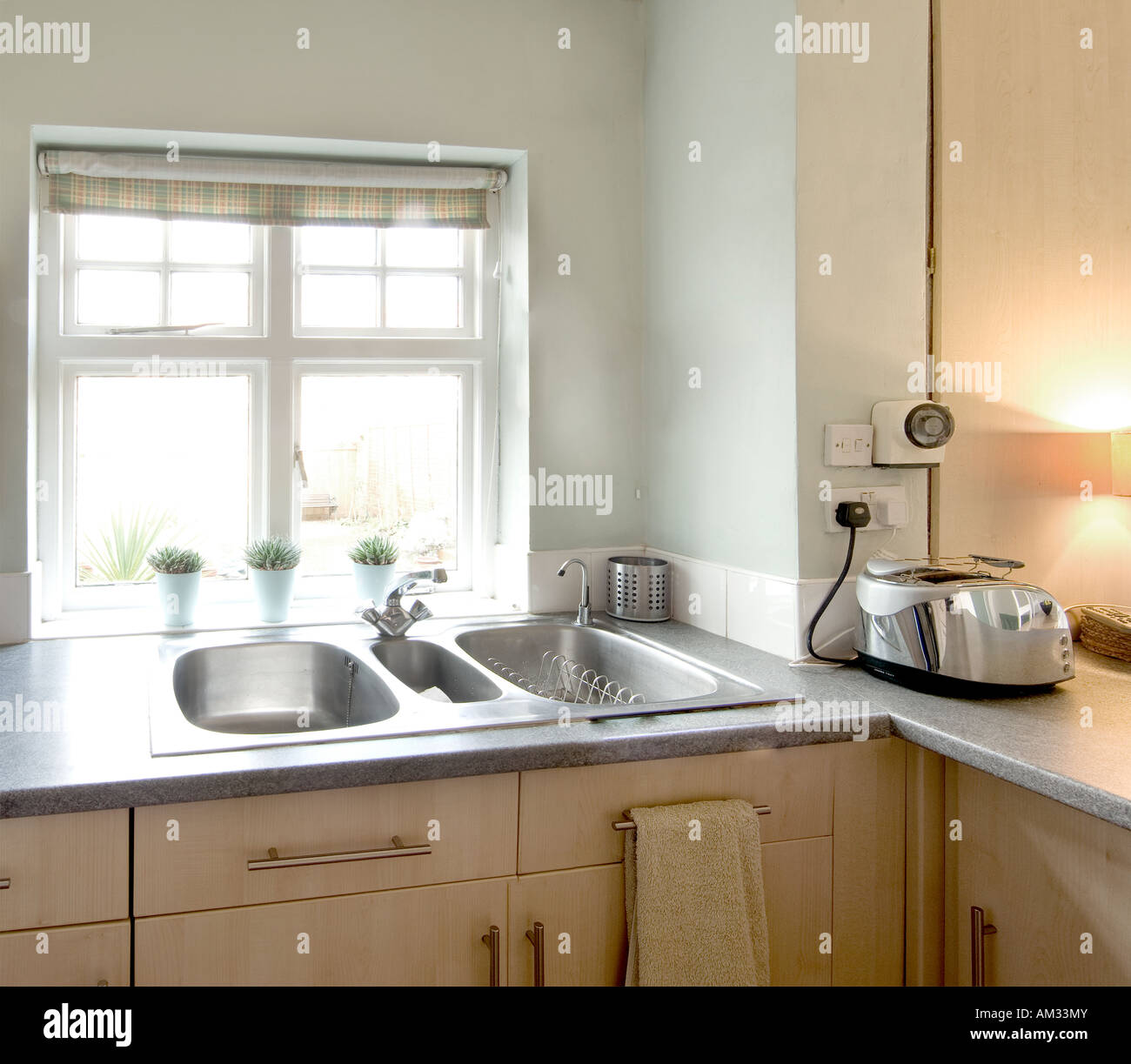 kitchen with appliances and table tops Stock Photo - Alamy