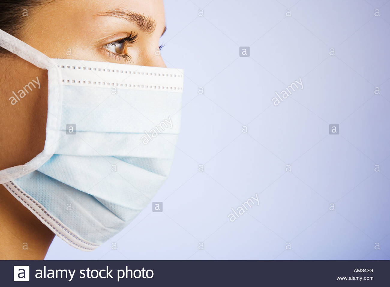 Young Woman Wearing Surgical Mask Stock Photos & Young Woman Wearing ...