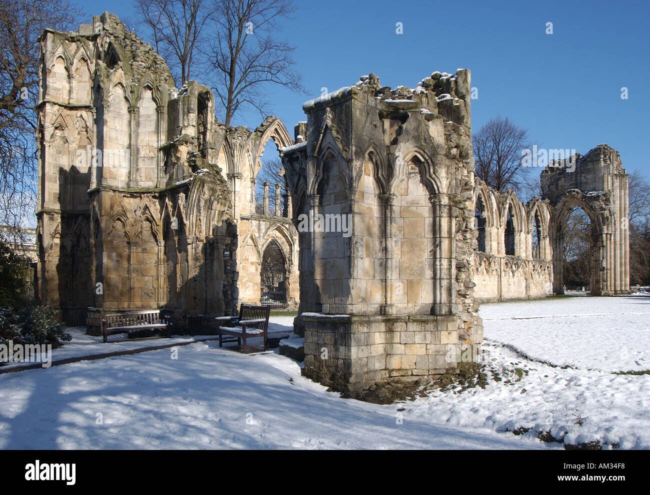 Ruins of St Marys Abbey in winter weather snow scene Museum Gardens ...